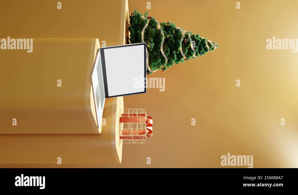 Laptop, Christmas Tree, and Wrapped Gift on yellow background vertical ...
