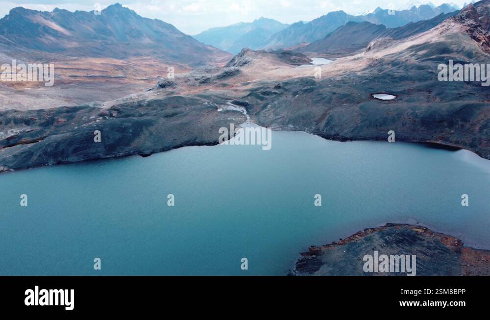 Incredible mountain range and lakes in emblematic Peru Andes Mountains ...