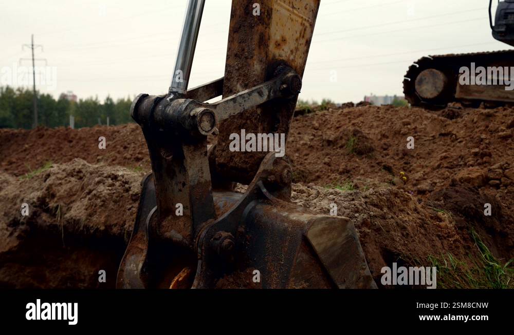 excavator digging trenches for gas pipes, closeup view, building new ...