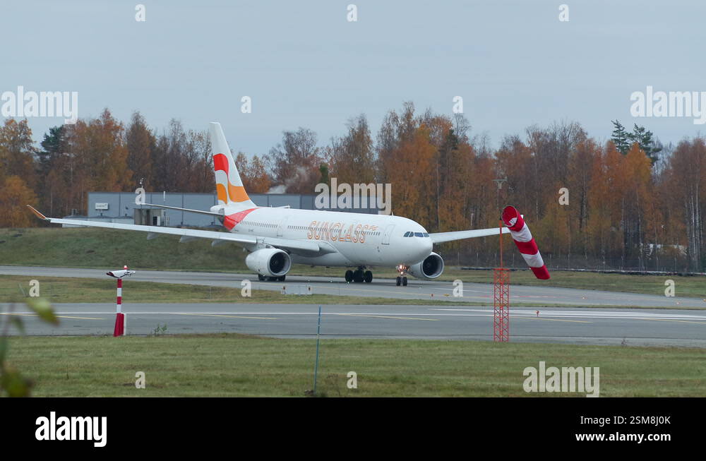 airplane airbus 330 sunclass airlines taxiing oslo airport norway ...