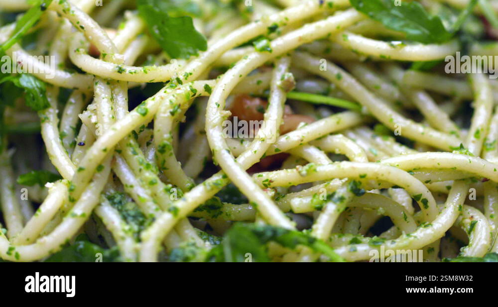 Rocket and basil spaghetti pesto. 4K image of healthy plant-based Stock ...