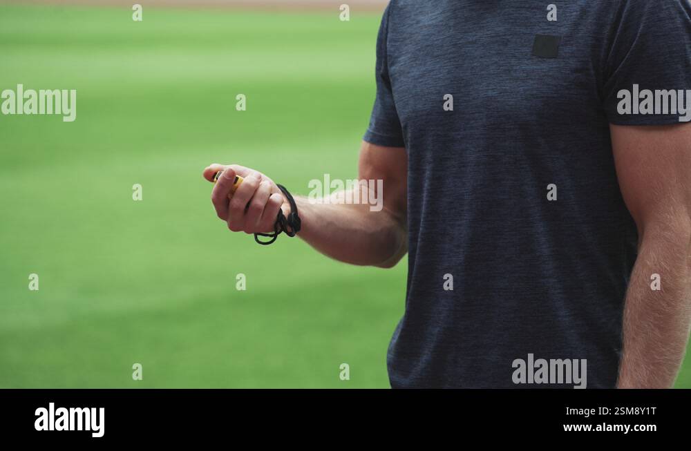 Sprinter are training at the stadium, the coach controls the time ...
