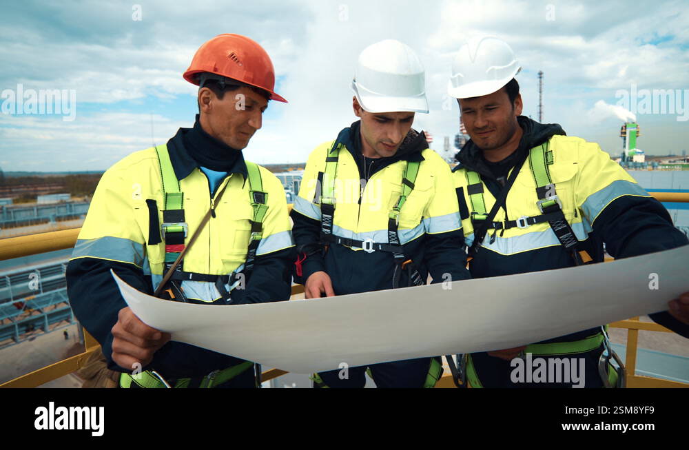 Group metallurgy engineer constructor discuss plan analyzing paper ...