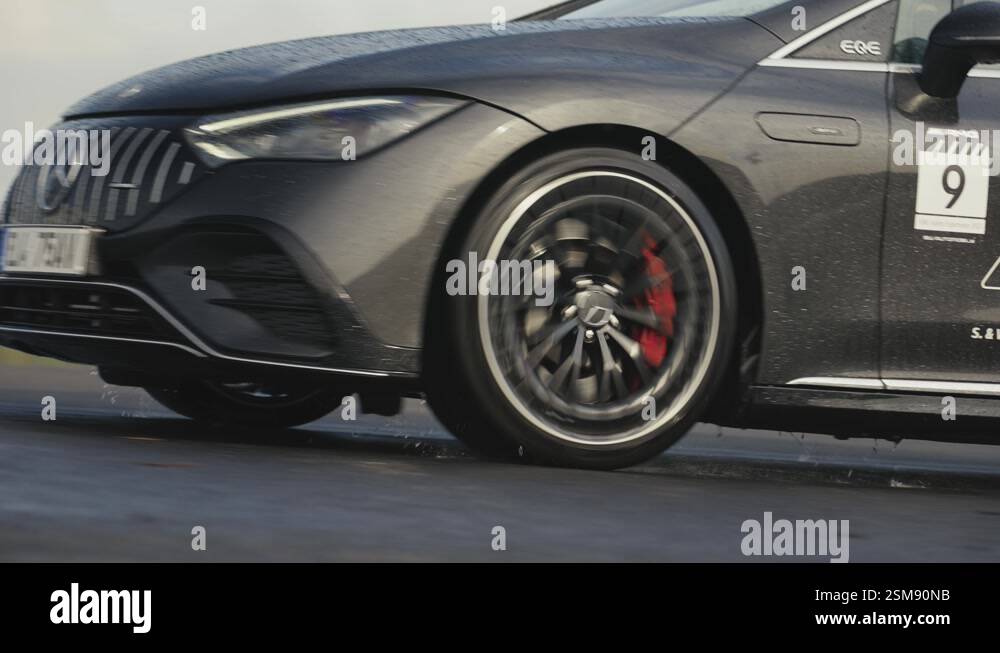 New electric Mercedes car capability test drive on wet safe driving ...