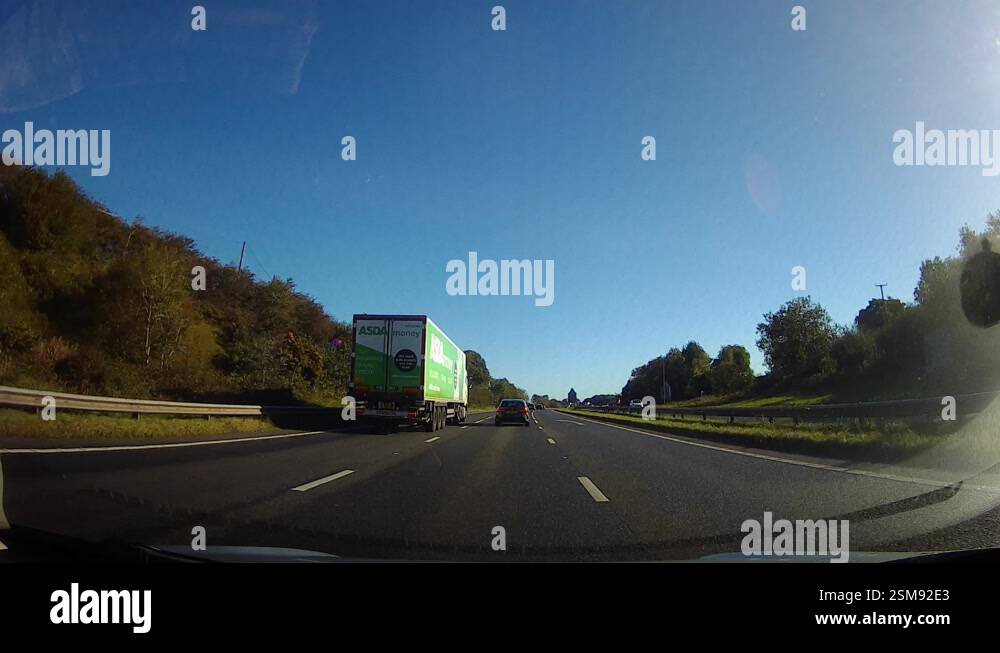 POV driving A55 motorway through rural Anglesey countryside traffic on ...