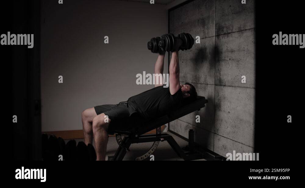 Incline dumbbell chest fly, cinematic lighting, white man dressed in ...