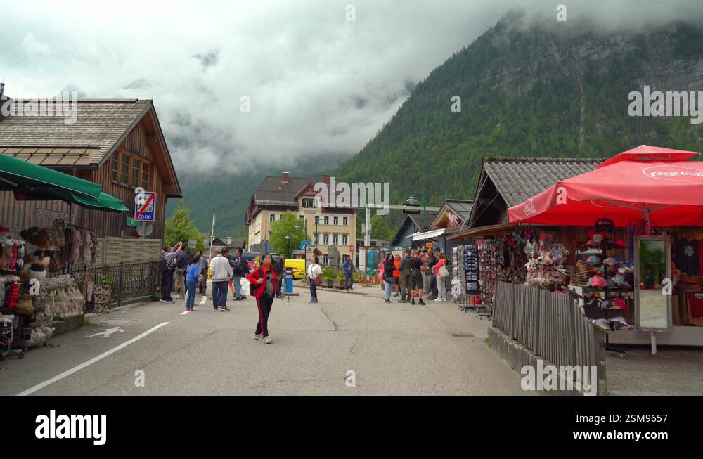 Hallstatt is a small town overlooking the Hallstätter See Stock Video ...