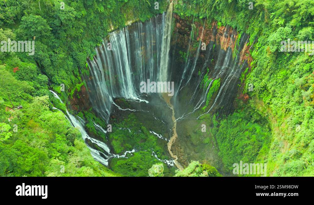 Aerial top view powerful Tumpak Sewu waterfall located in Lumajang ...