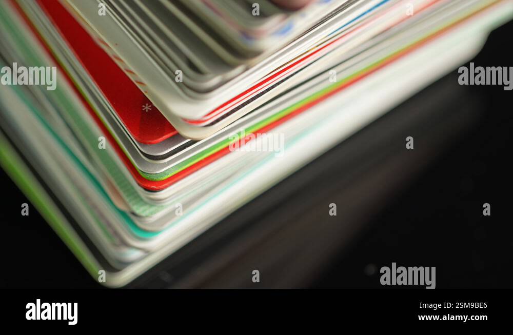 Pile of credit cards close up macro slowly rotating. Banking online and ...