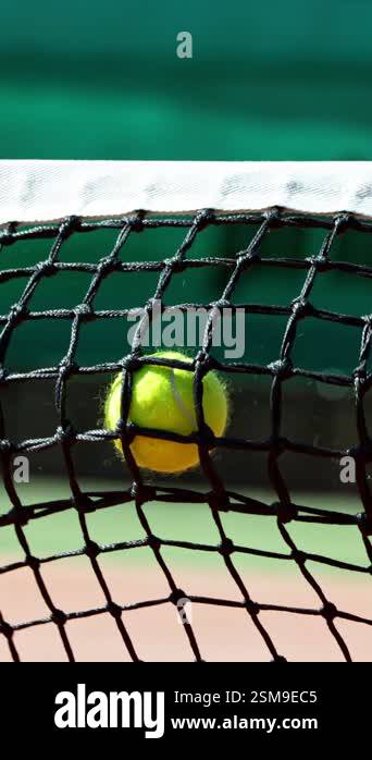 Super Slow Motion of Flying Tennis Ball Hitting a Net. Low Depth of ...