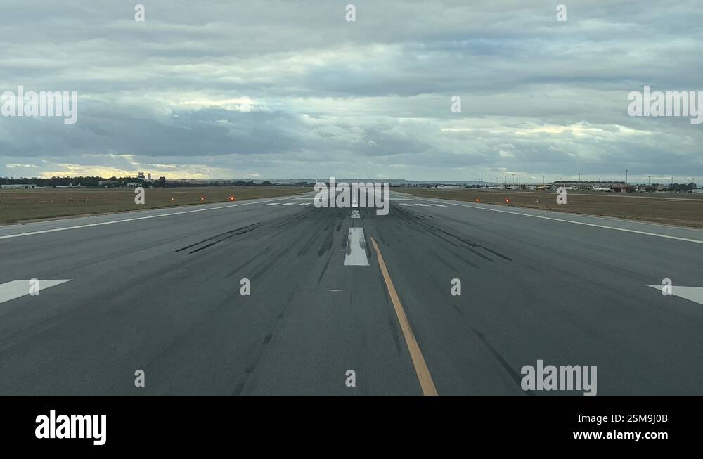 Real time take-off roll of a jet in a winter cloudy day, as seen by the ...