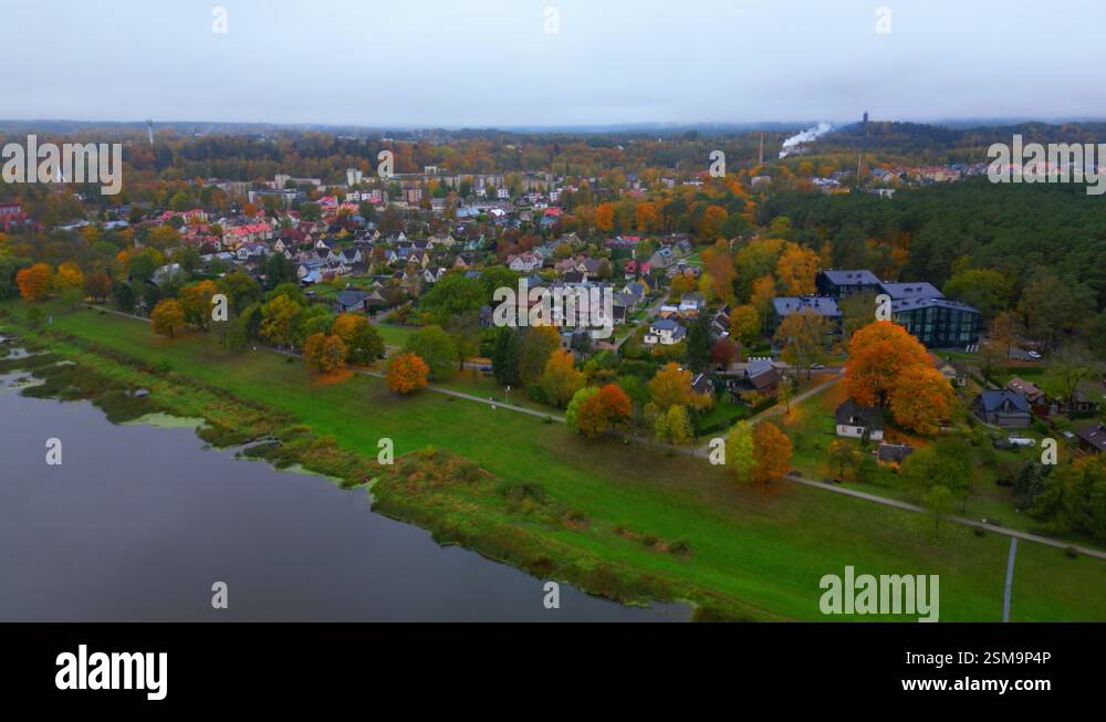 Lithuanian village next to Memel river Birstonas during clouded autumn ...