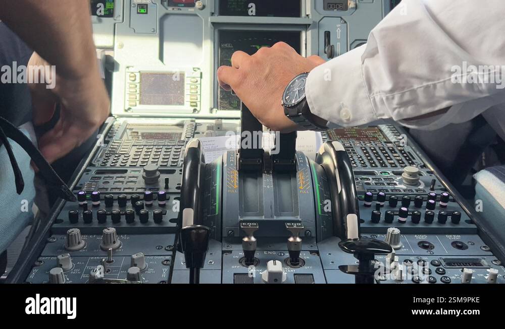 Pilot adjusting the engine power for take off in a modern Airbus 320 ...