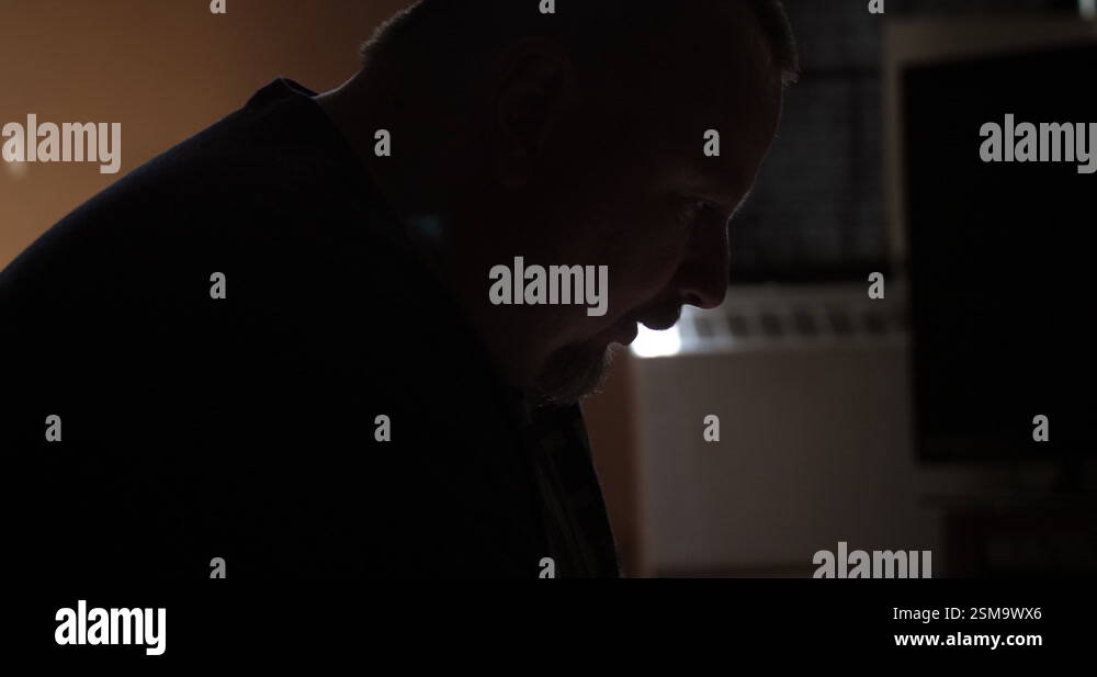 Sad, crying man sitting on couch. Sad, unhappy, grieving, crying man ...