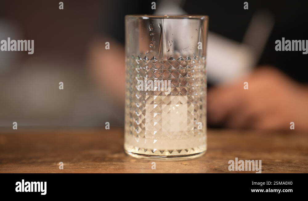 Night club concept of 4k Resolution. A bartender is mixing drinks for ...