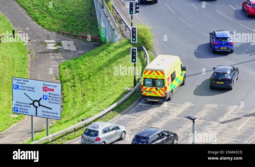 Aerial View Of Ambulance And Cars Driving In The Road In Rotherham ...