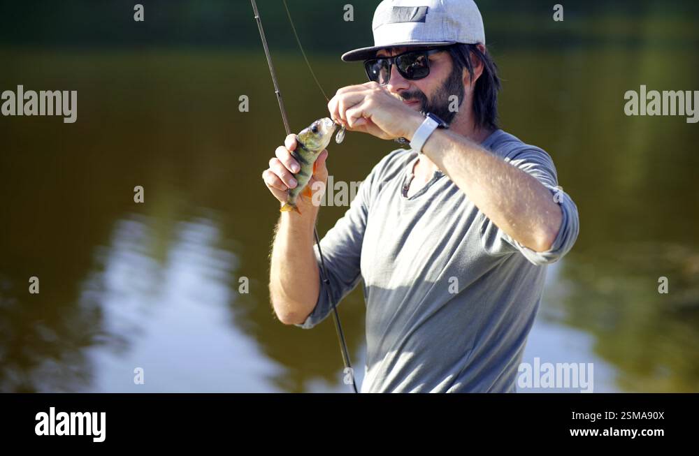 Recreation Fisher. Fisherman Trophy Pilling On Braid. Happy Angler ...