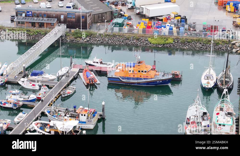 RNLI lifeboat Newlyn Harbour Cornwall drone,aerial Stock Video Footage ...