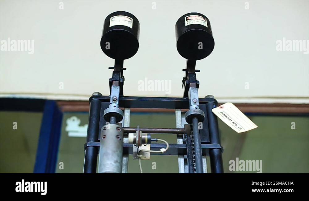 Double standard auto compactor with rotating base compacts two Marshall ...