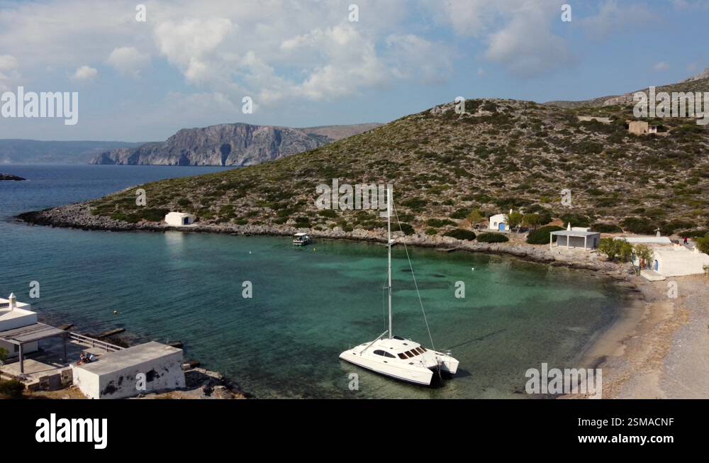 Kythira greek island beach and white Kythira fortress with white ...