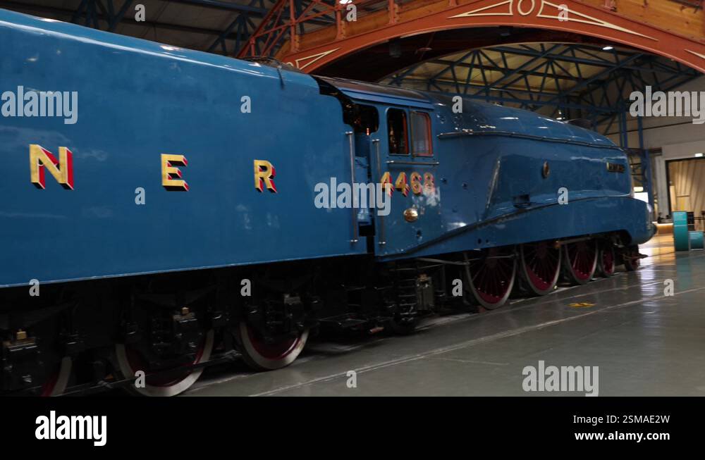 panning shot of a LNER train in The National Railway Museum In York ...