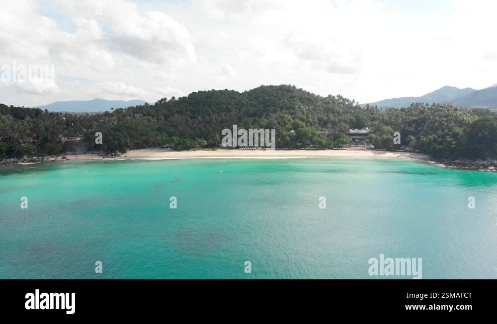An aerial slow reveal of Pansea Beach resort, located on the West Coast ...
