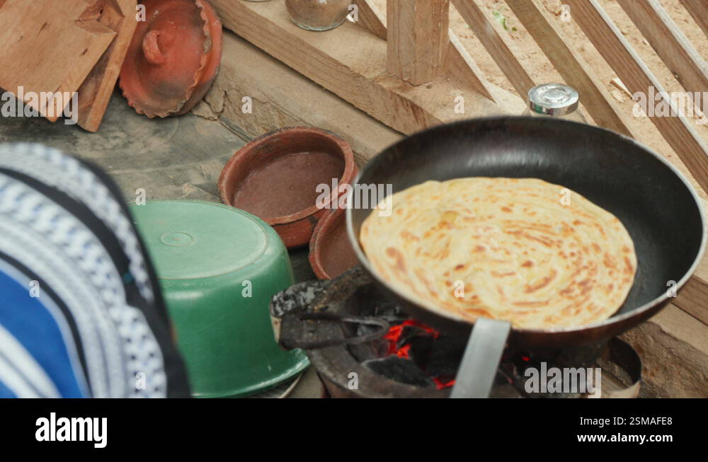 Traditional chapati cooking Stock Videos & Footage - HD and 4K Video ...