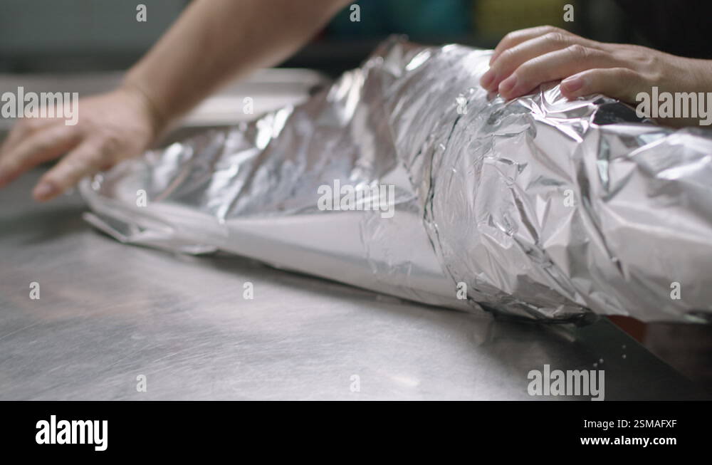 Brazilian meat skewer preparation, wrapping in foil Stock Video Footage ...