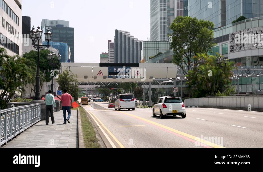 Traffic Going Past On New Bridge Road In Singapore With ERP Sign On ...