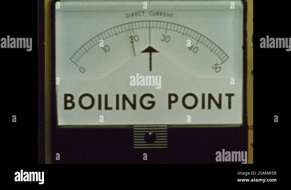 1980s: Science experiment for boiling point of water. Balls in boiling ...