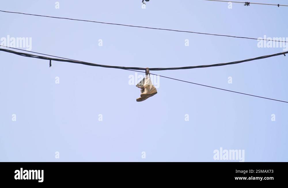 Shoes on electrical wire Stock Videos & Footage - HD and 4K Video Clips ...