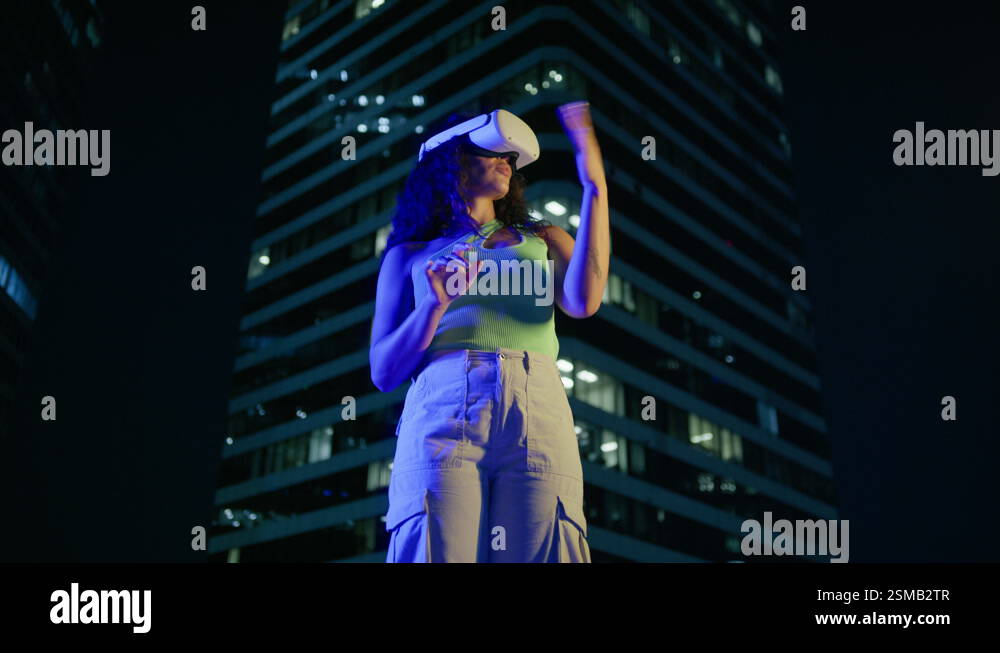 Girl wearing VR glasses moving hands in air, typing on keyboard in cyber space Stock Video ...