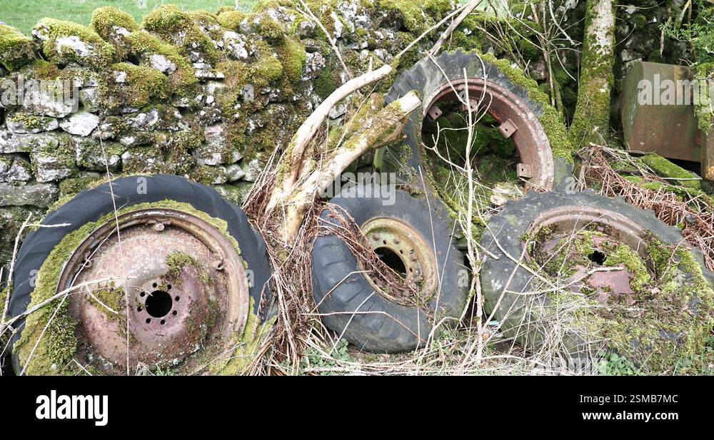 Old tractor wheels on a farm in Chapel-le-Dale, below Whernside ...