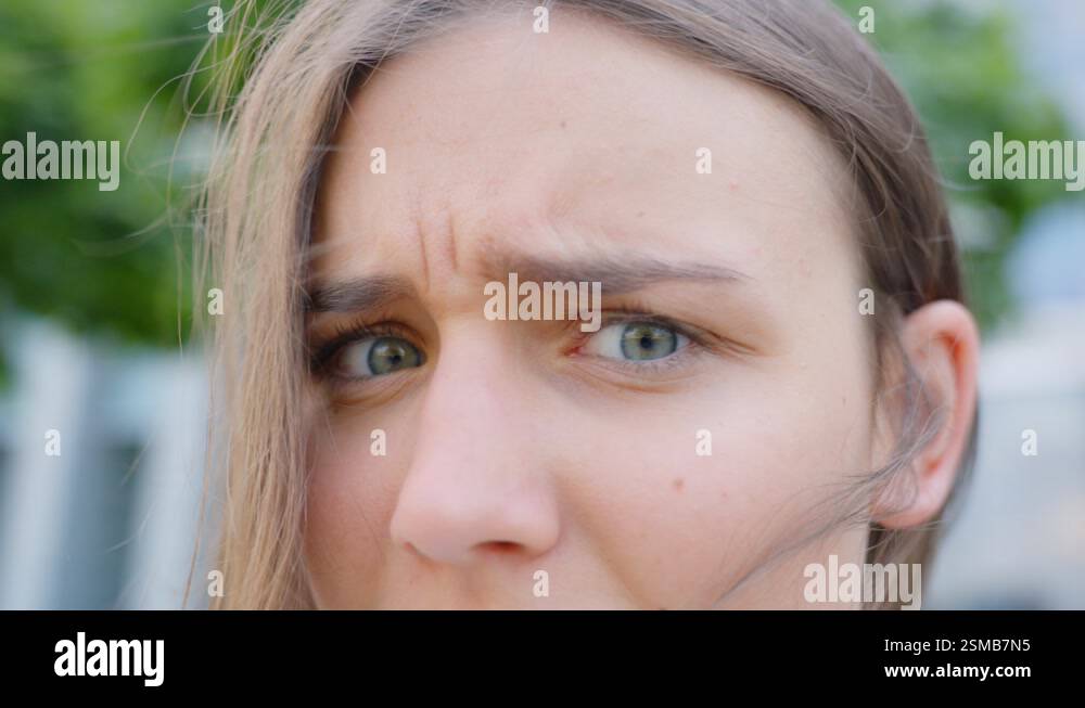 Woman showing disapproval or disbelief through her facial expression ...