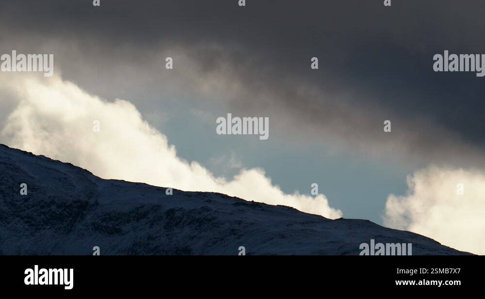 Clouds blowing over Wet side Edge from Ambleside, Lake District, UK ...