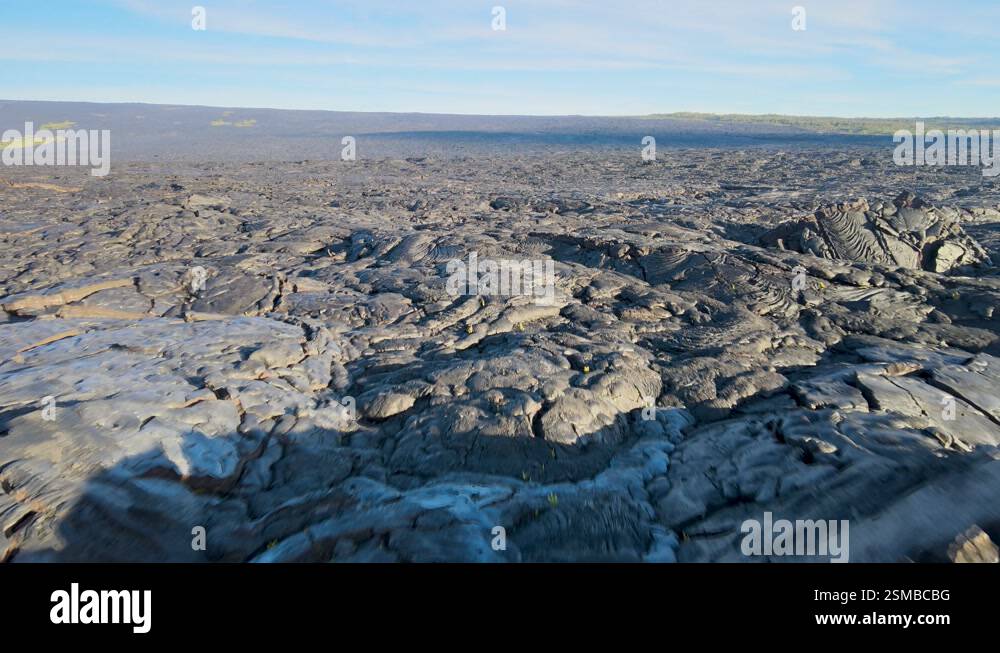 Dynamic drone shot commencing from a low and rapid ascent to unveil the ...