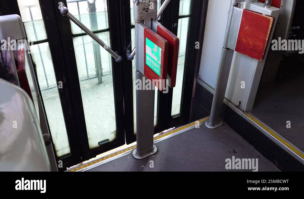 View of a double decker tram automatic door in Hong Kong Stock Video ...