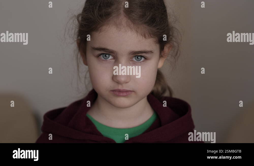 Human Face. Young Serious Teenage Girl With Blonde Long Hair Look at ...