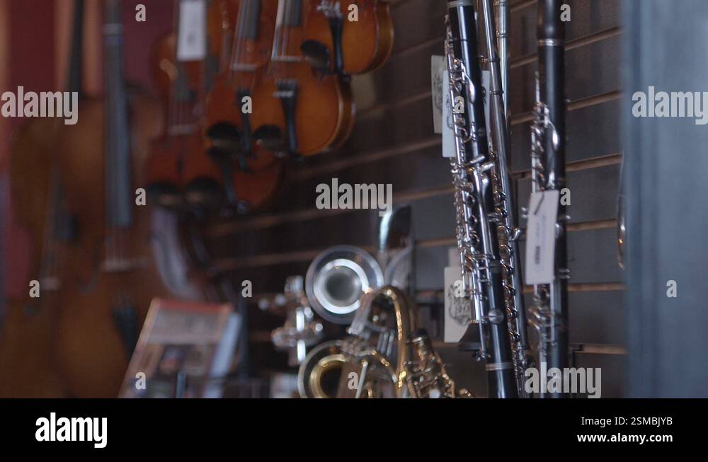 This video shows a close up rack focus going from the clarinet in the ...