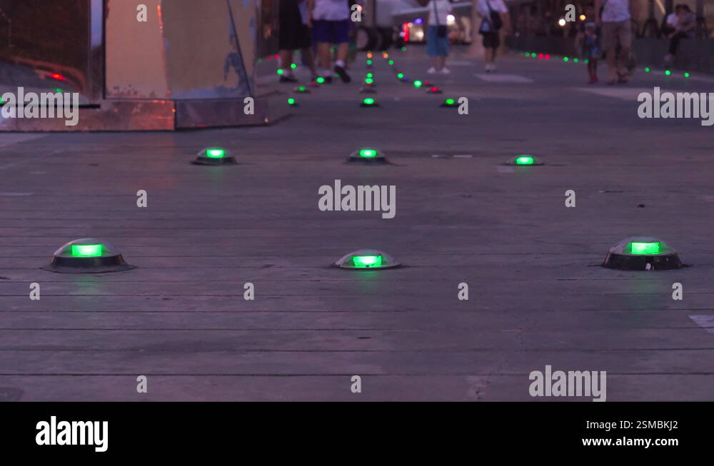 Raised pavement markers or RPMs or Road studs installed on a pavement ...