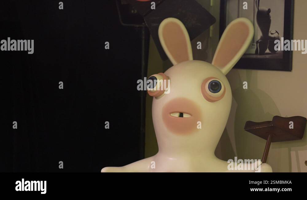 Raving Rabbid mascot from the Futuroscope park holding a powder flash ...