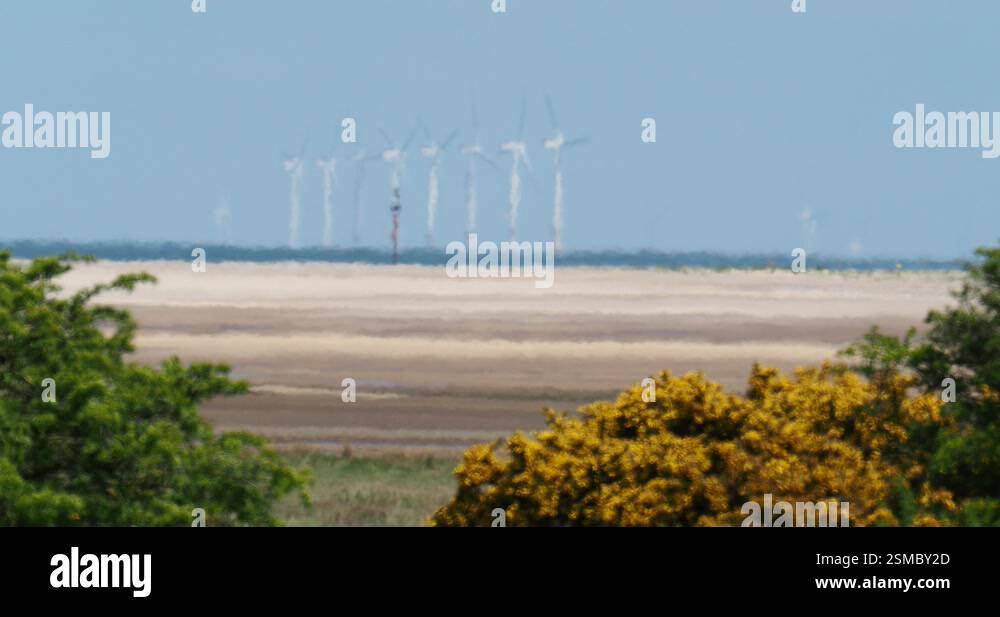 Offshore wind turbines off in Cley, Norfolk, UK Stock Video Footage - Alamy