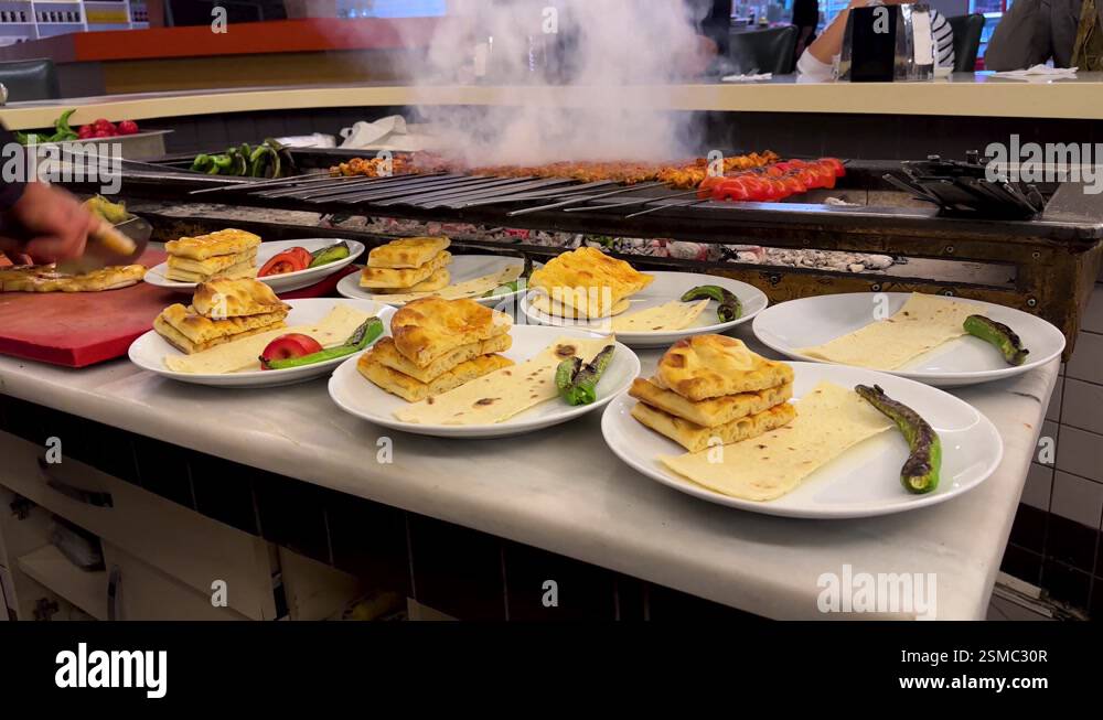 Serve Turkish food by hand man made prepare kebab barbecue BBQ Fried ...