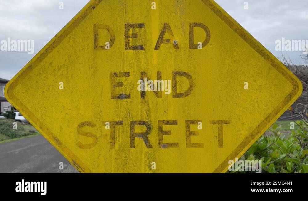 Close Up - Weathered Dead End Signpost Stock Video Footage - Alamy
