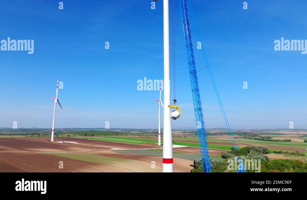 Crawler Crane Next To Wind Turbine Tower During Assembly On Wind Farm ...
