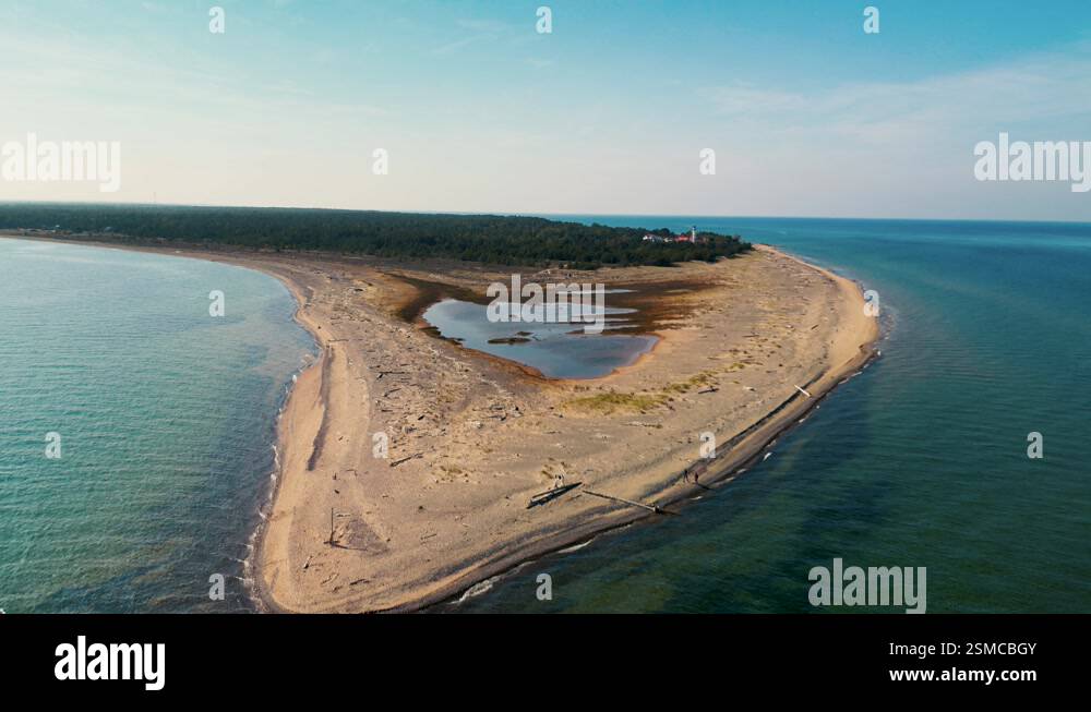 Aerial ascent fly out from Whitefish Point peninsula tip, Michigan ...