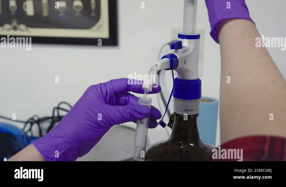 Measurement pump in science lab is used to put chemicals into test ...