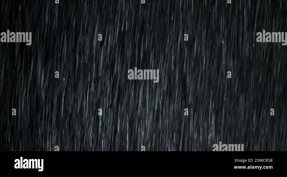 A heavy rain wall storms in front of the black screen in 4K loopable Stock Video Footage - Alamy