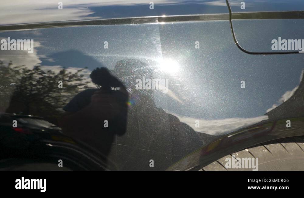 Swirl marks and defects on a black car Stock Video Footage - Alamy