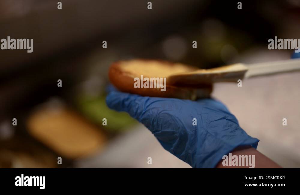 closeup view of cooking hamburger process in kitchens of fast food ...